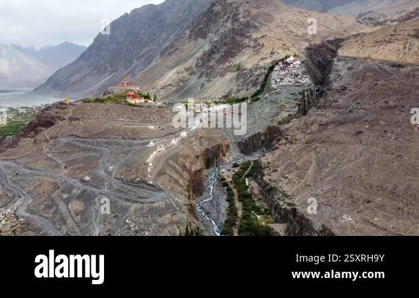 An aerial view of the Diskit Monastery and Maitreya Buddha of Diskit in ...