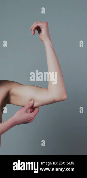 Vertical Format Video of Weight Loss Concept. Woman Pinching Upper Arm ...