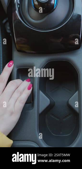 Vertical Format Video of Finger pushing the button of car parking ...