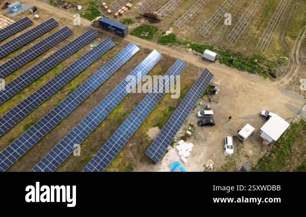 Electrical power plant under construction with truck delivering ...