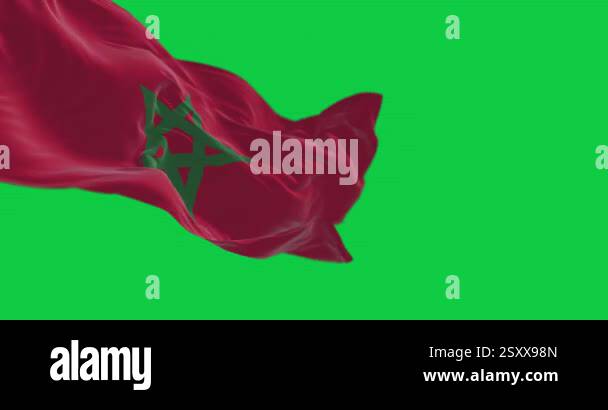 Morocco national flag waving in the wind isolated on green background ...