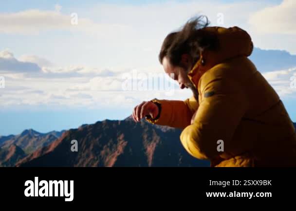 Hiker battling strong winds and cold weather tumbles over a cliff on ...