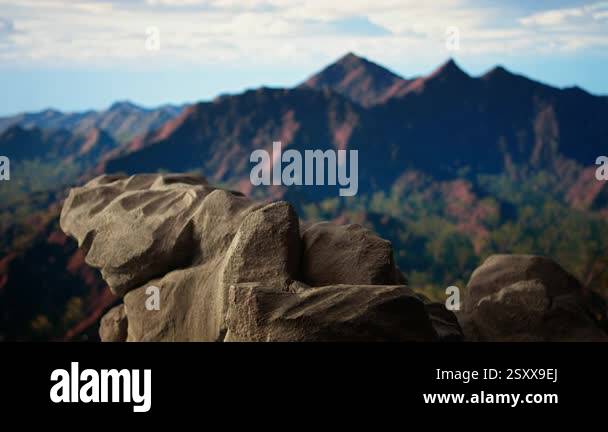 Dramatic alpine landscape featuring rugged rock formations and lush ...