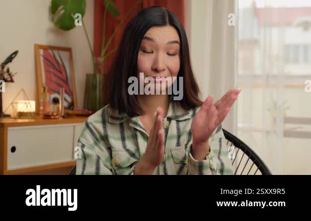 Asian Korean Chinese Japanese woman clapping hands female girl home ...