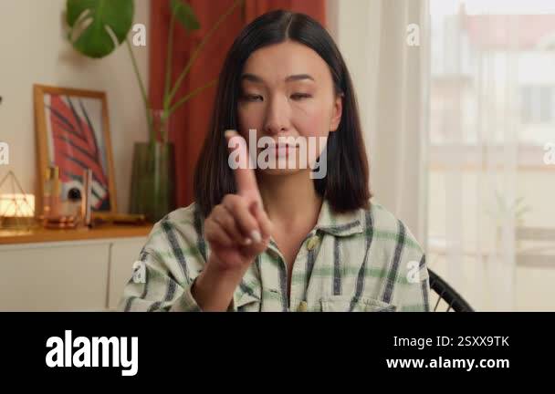 Serious confident Asian Korean Chinese Japanese woman shaking finger no ...