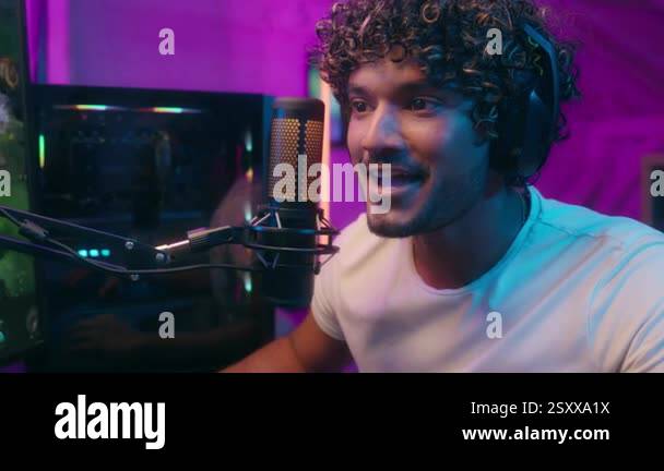 Happy excited Arabian Latino man winner guy computer addict e-sport ...