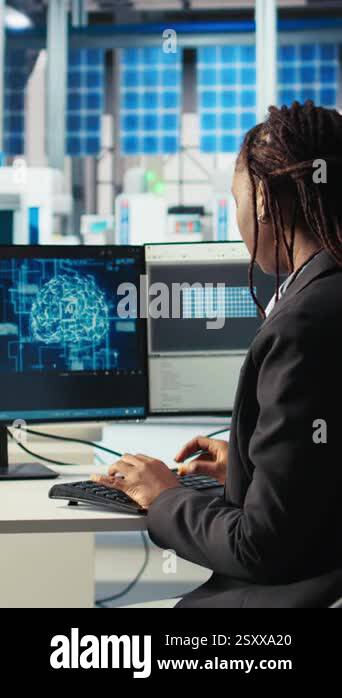 Vertical video Software developer in photovoltaics factory using ...