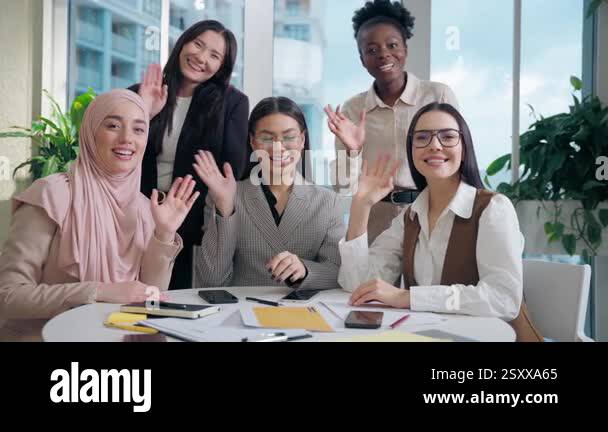 Friendly diverse team waving Stock Videos & Footage - HD and 4K Video ...