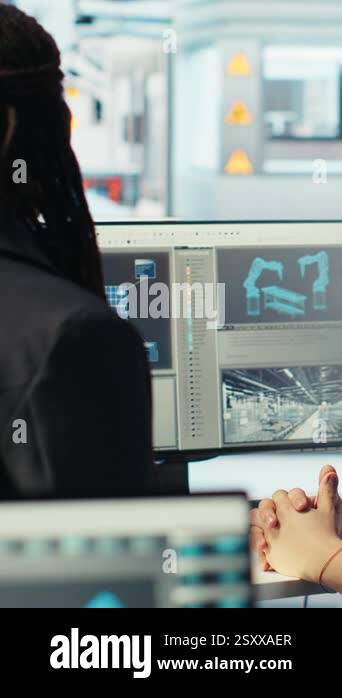 Vertical video Photovoltaics factory worker discussing with woman about ...