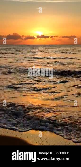 Beautiful sunrise on sea. Rising sun over sea. Sun shining from behind ...