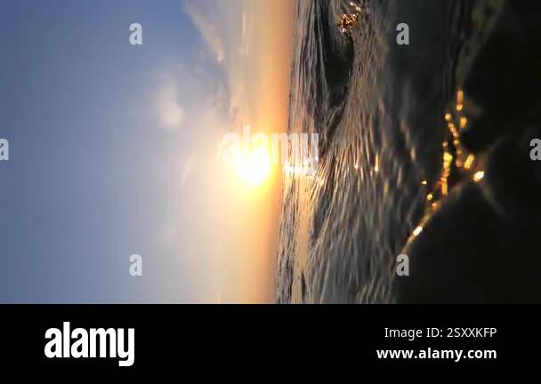 Beautiful sun path on the surface of the sea water from the shining sun ...