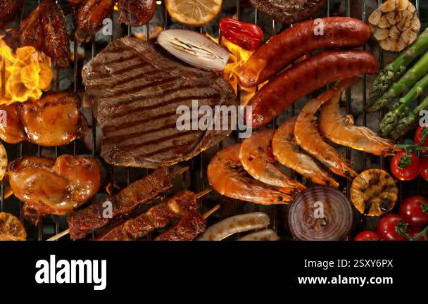 Slow Motion of Various Types of Meat and Vegetables on a Grill with ...