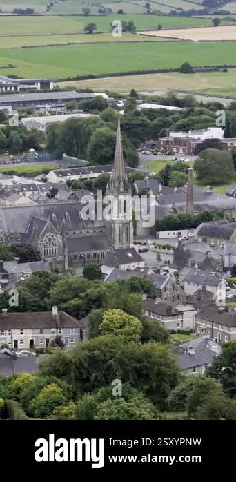 An overhead shot reveals a town's architecture, mostly residential ...