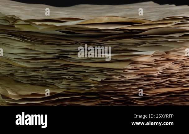 Yellow grunge ancient parchment paper rotation. Old textured paper on ...