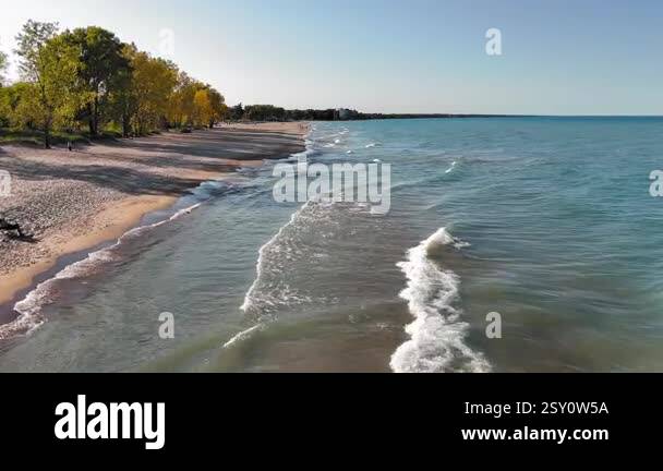 Serene coastline with gentle waves, Scenic coastal view with a sandy ...