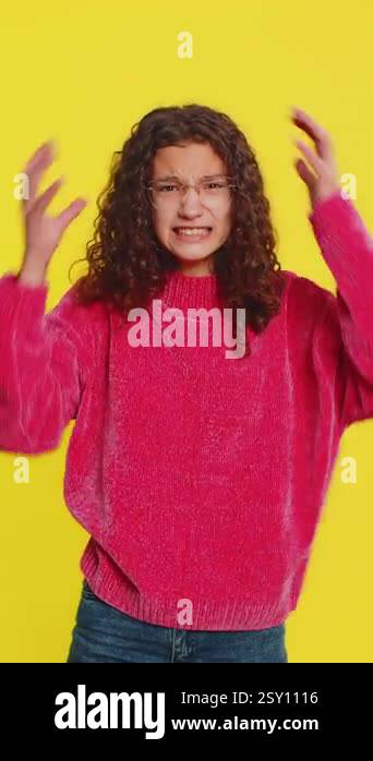 Irritated angry Caucasian young teenager girl screams from stress ...
