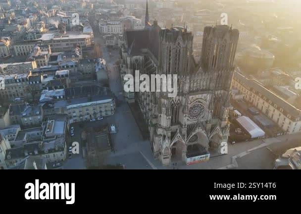 A breathtaking aerial view flying over the intricate gothic facade of ...