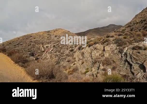 The rugged landscape of southern Spain, with dry hills, rock formations ...
