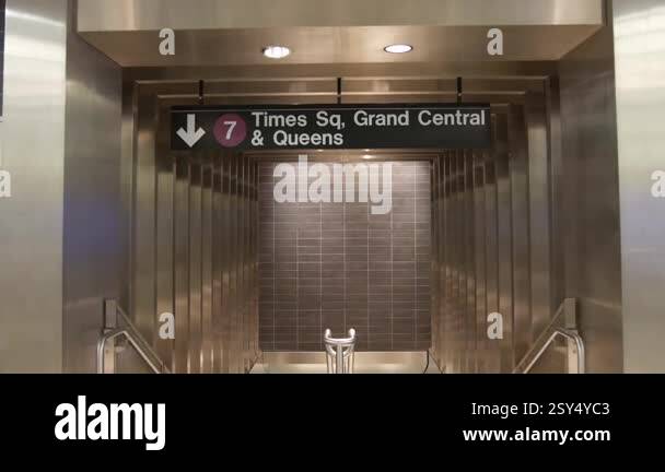 New York subway station interior. Text sign: Times Square, Grand ...