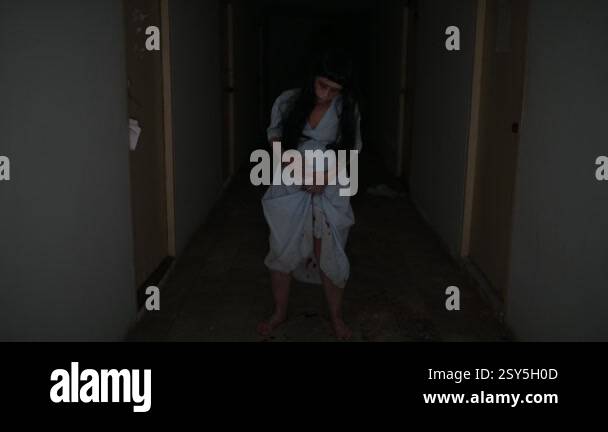 scary pregnant psycho female zombie posing in creepy hospital ...