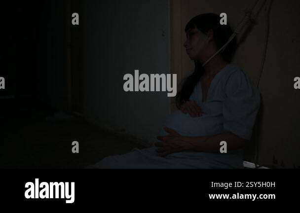 scary pregnant psycho female zombie posing in creepy hospital ...