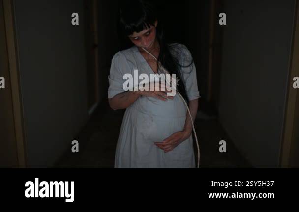 scary pregnant psycho female zombie posing in creepy hospital ...