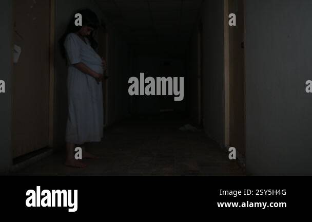 scary pregnant psycho female zombie posing in creepy hospital ...
