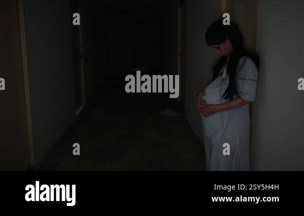 scary pregnant psycho female zombie posing in creepy hospital ...