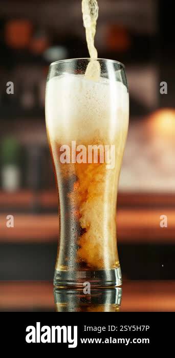 Super Slow Motion of Pouring Beer into Pint. Filmed on High Speed ...