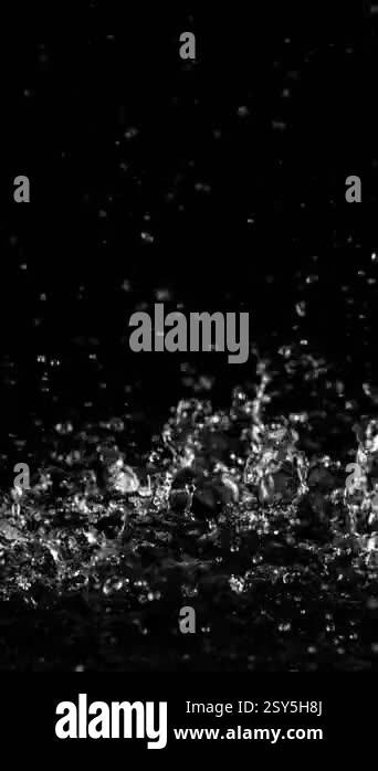Super Slow Motion of Splashing Water Isolated on Black Background ...
