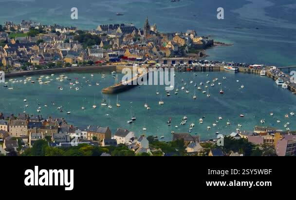 Aerial view of Roscoff cityscape, with Roscoff jetty in the background ...
