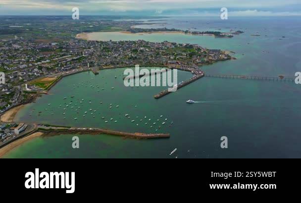 Aerial view of Roscoff cityscape, with Roscoff jetty in the background ...