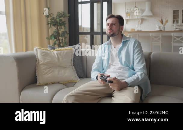 Frustrated Man Playing Video Game On Console Struggling And Losing At ...