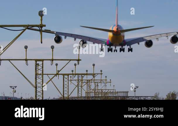 Massive passenger jet landing gracefully on airport runway, smoothly ...