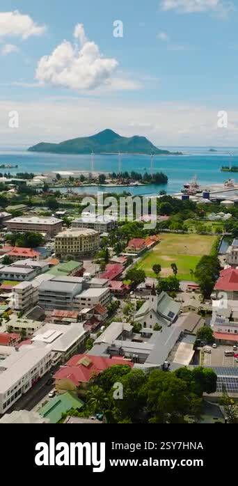 An expansive view of Victoria city showing urban buildings, the harbor ...