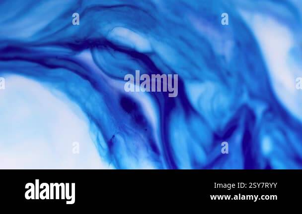 Marble spill. Blue ink. Soft wavy spread of bright dye in thick light ...