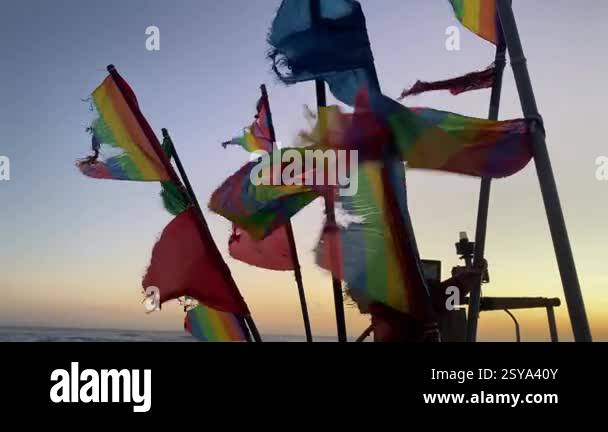Weathered maritime fishing signal flags in vibrant rainbow colors ...