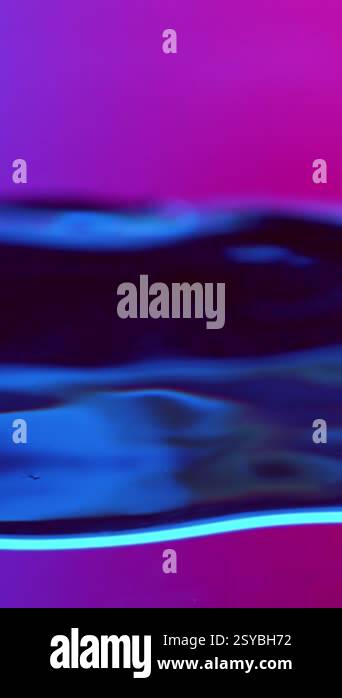 Super Slow Motion of Splashing Water Waves Illuminated by Neon Lights ...