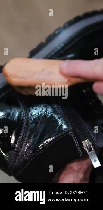 Cleaning Leather Shoes With Brush. Shoe Care Footwear Maintenance ...