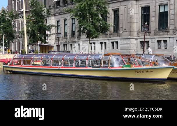 Canal Cruise Boat At The Oude Turfmarkt Street At Amsterdam The ...
