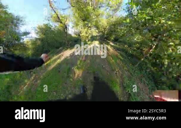First-Person View of a Shadow Cast by a Person Walking Through a Sunlit ...