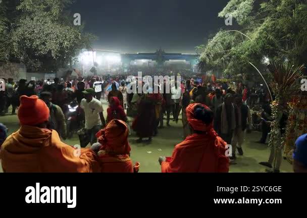massive gathering of devotees walking to holy triveni sangam at mahakumbh at night video is ...