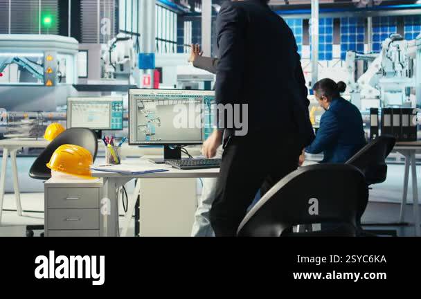 Eco friendly photovoltaics factory manager working with solar ...