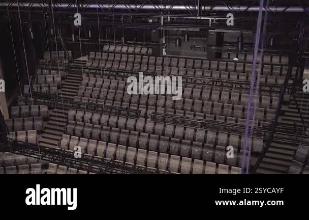 Many Theater Battens are Lifted Above the Empty Seats in a Wave. In ...