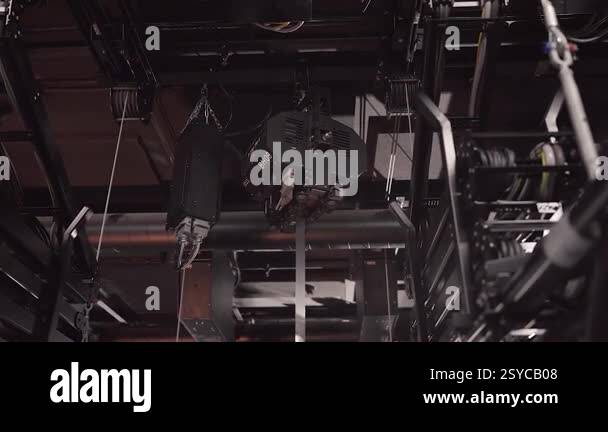 Steelband Hoist Lowers and Raises Belt with a Red Metal Loop at the End ...