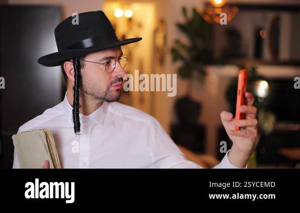 Handsome traditional jewish man reading a book Stock Video Footage - Alamy