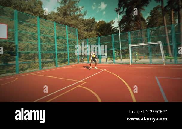 Energetic outdoor sports setting featuring basketball and soccer ...