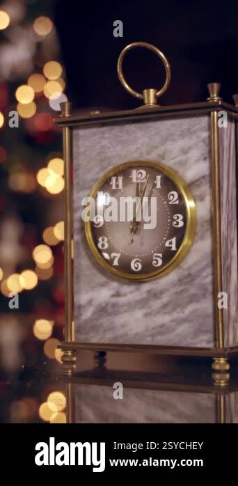 Nice clock on blur christmas background. Clock is showing midnight. It ...