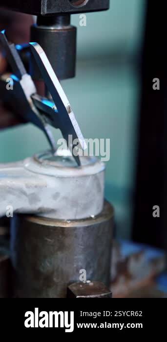 Worker using vernier calipers. Industrial worker measuring detail with ...