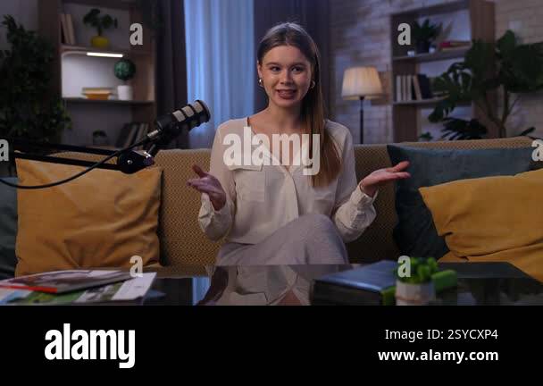 In this intimate studio setting, a woman shares her insights on ...